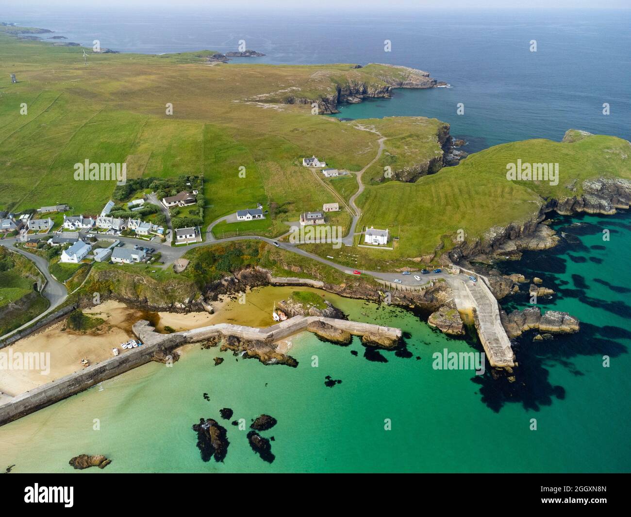 Aerial view from drone of village and harbour at Port Ness at northern ...