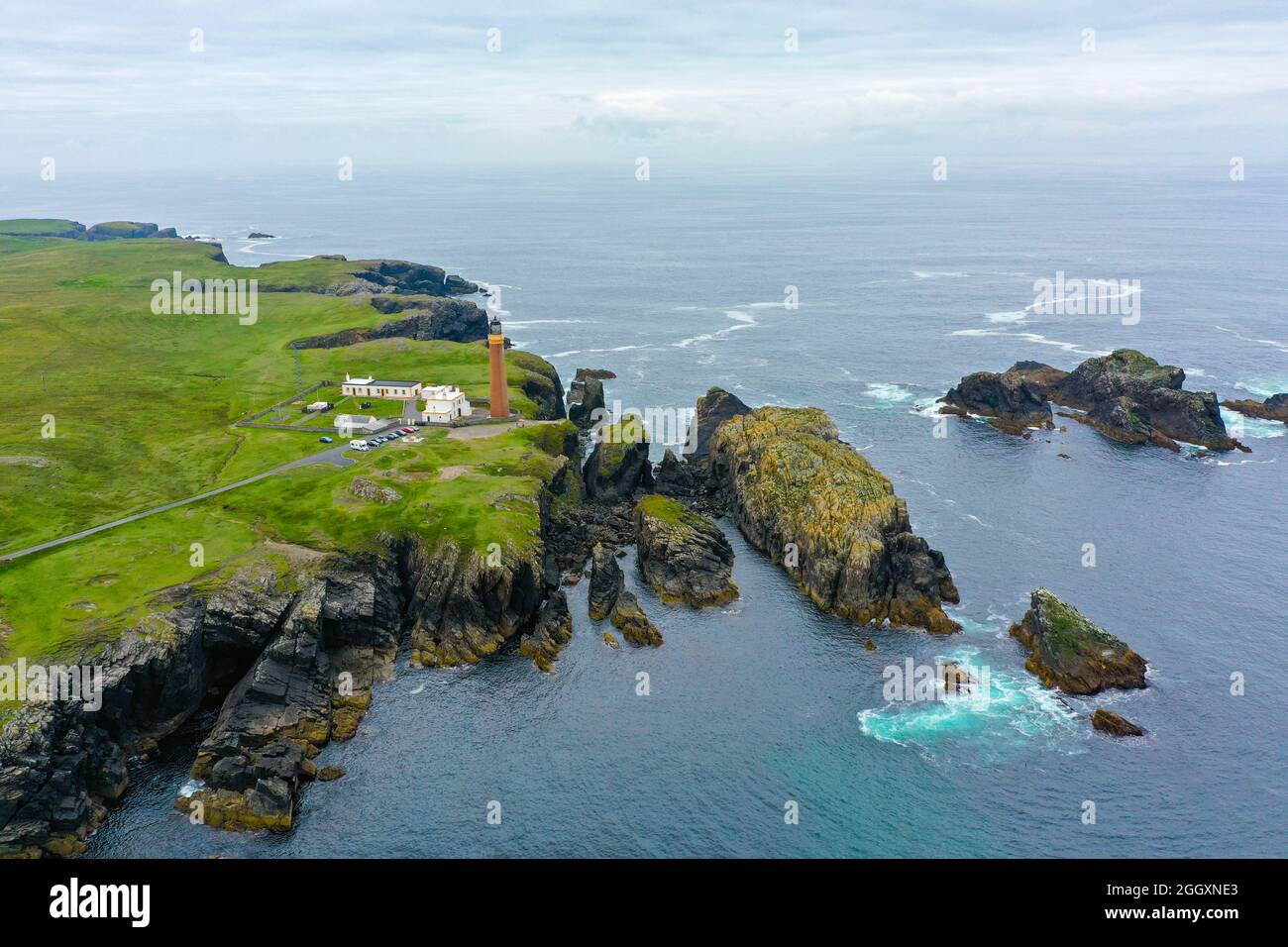 Aerial view from drone of red brick Butt of Lewis lighthouse designed ...