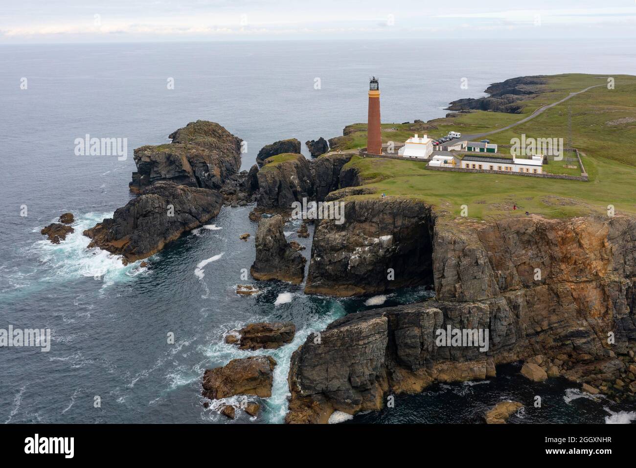 Aerial view from drone of red brick Butt of Lewis lighthouse designed ...