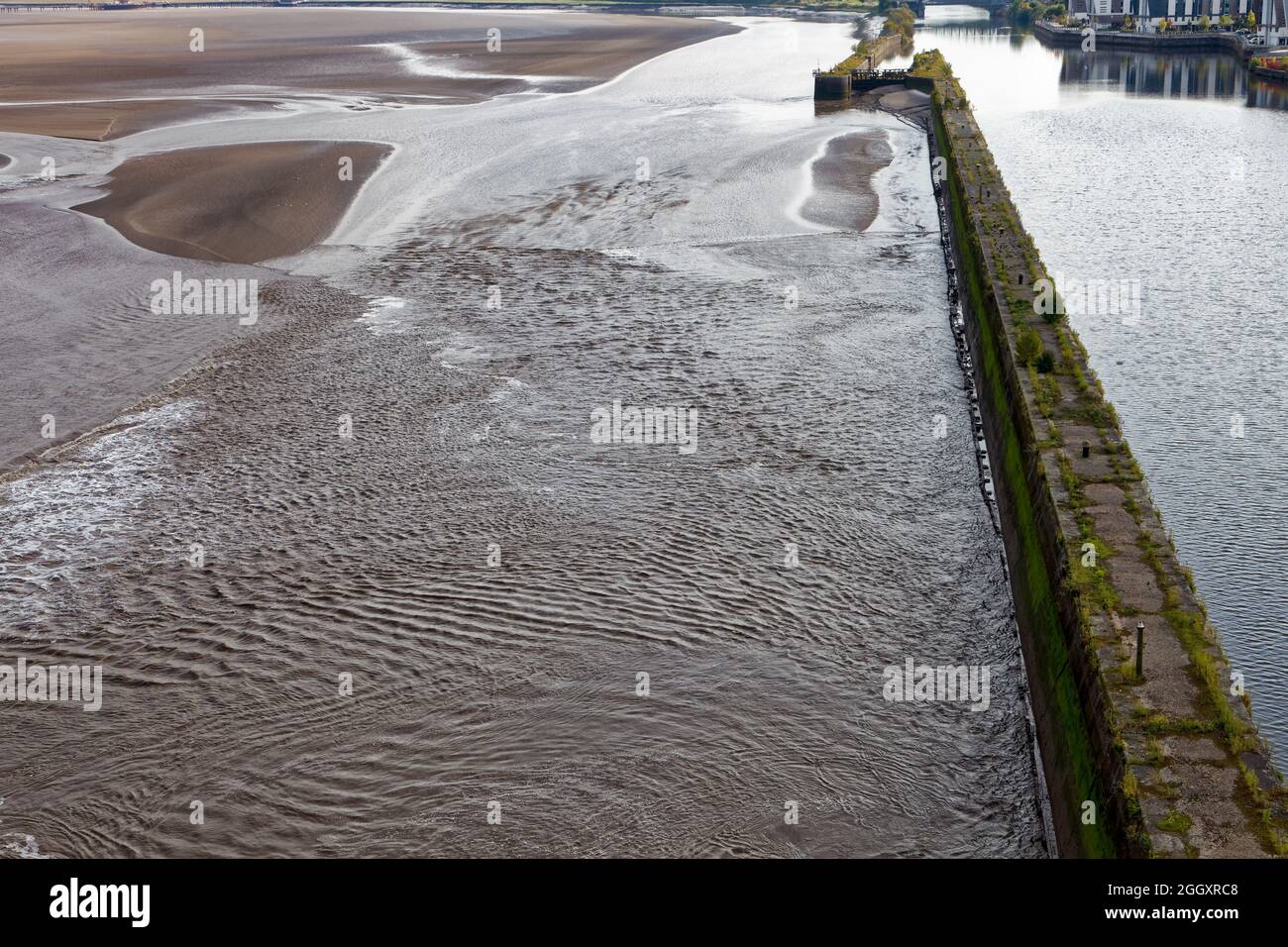 A view of the Mersey Tidal Bore from above as it passes one of the ...