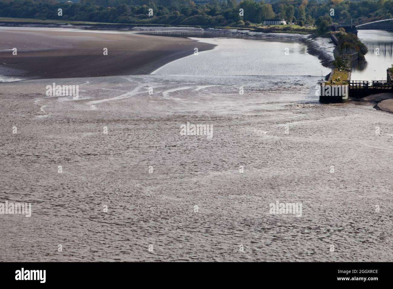 A view of the Mersey Tidal Bore from above as it passes one of the ...