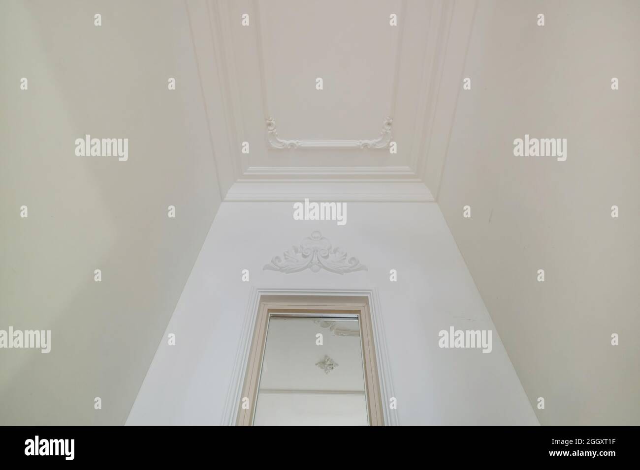corner of ceiling and walls with intricate crown moulding. Interior ...