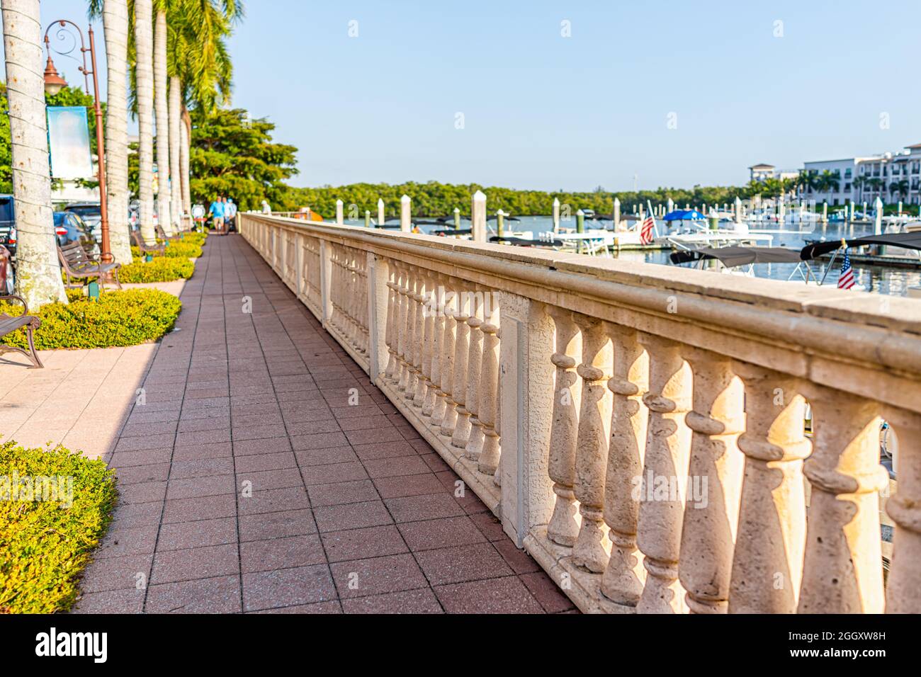 Marble railing fence by boardwalk at Bayfront marina residential ...