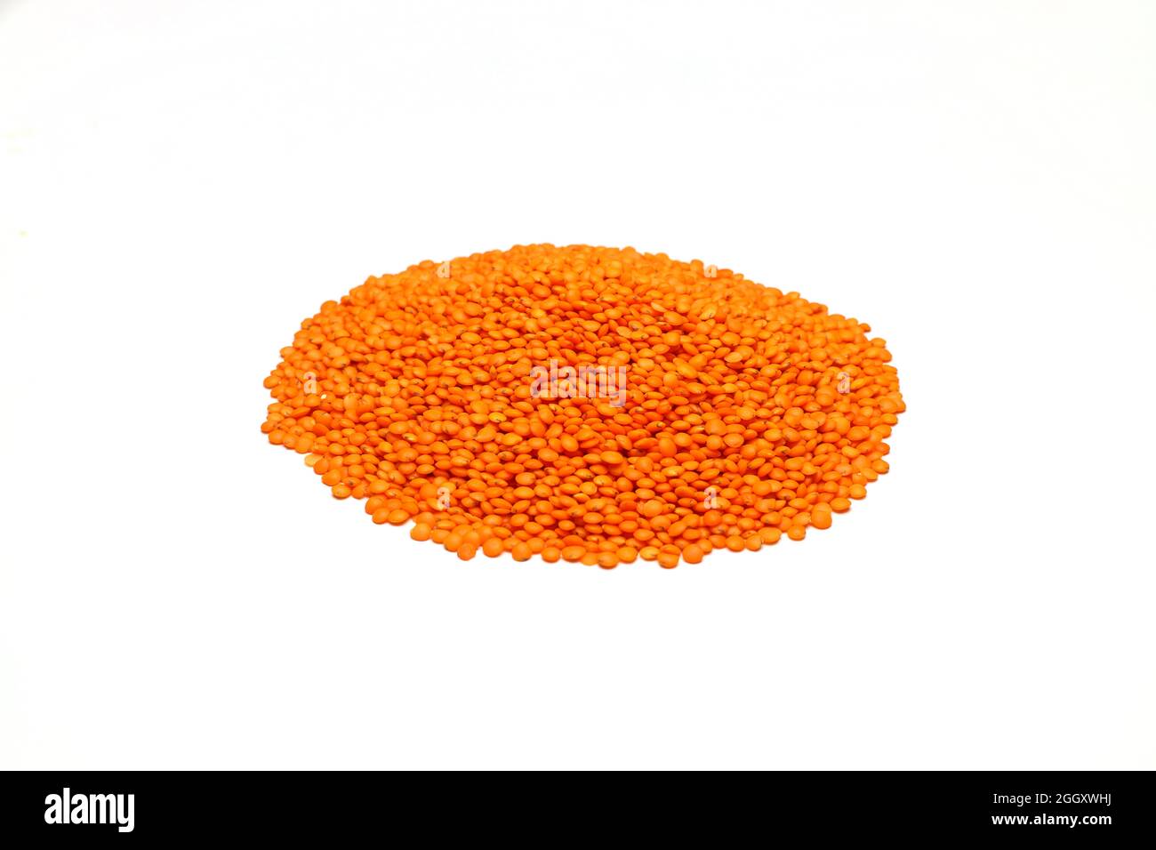 Raw red lentils seeds heap on white background. Food ingredient. Top view Stock Photo - Alamy