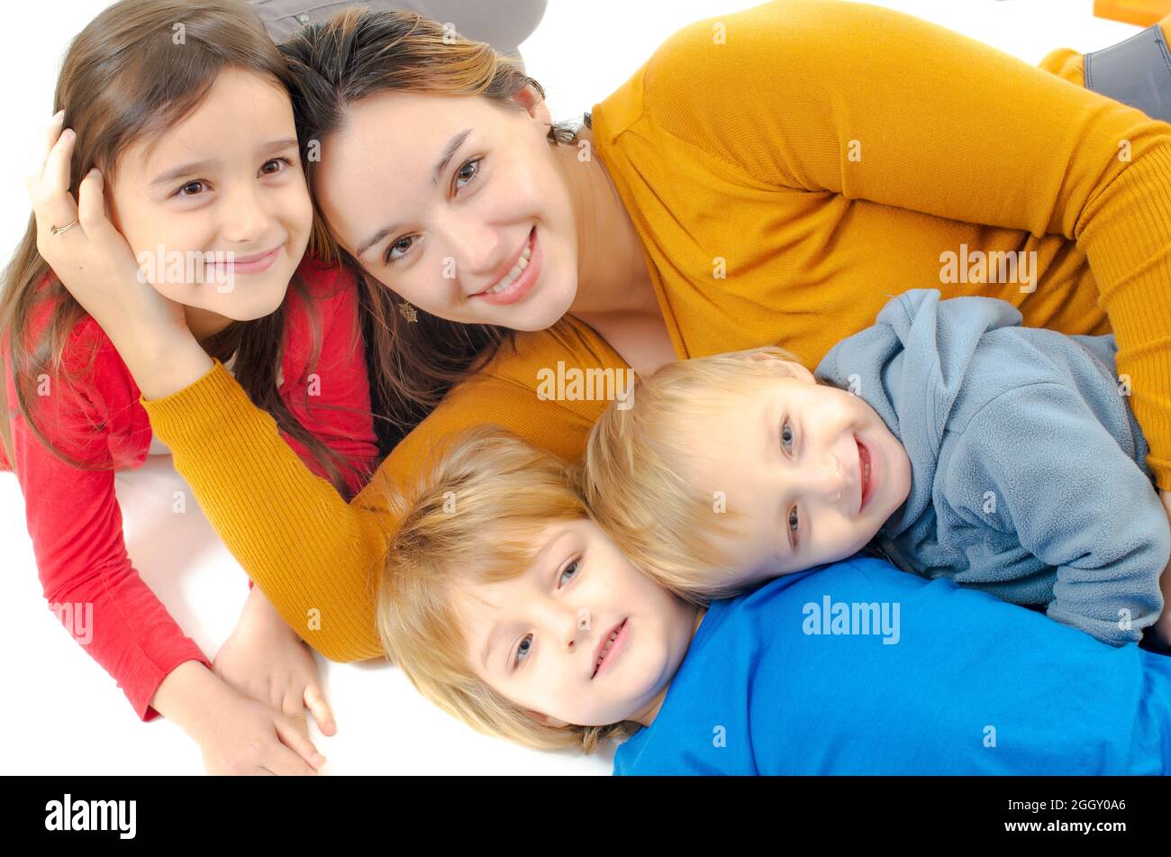 Family three kids resting hi-res stock photography and images - Alamy