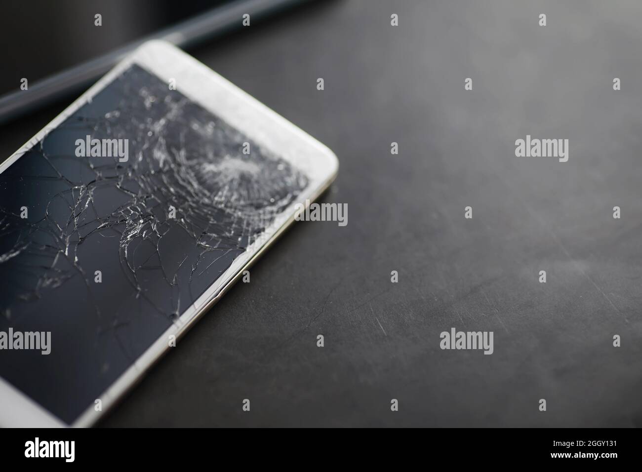 Crack on the glass. Broken screen. Broken phone. Cracked glass ...