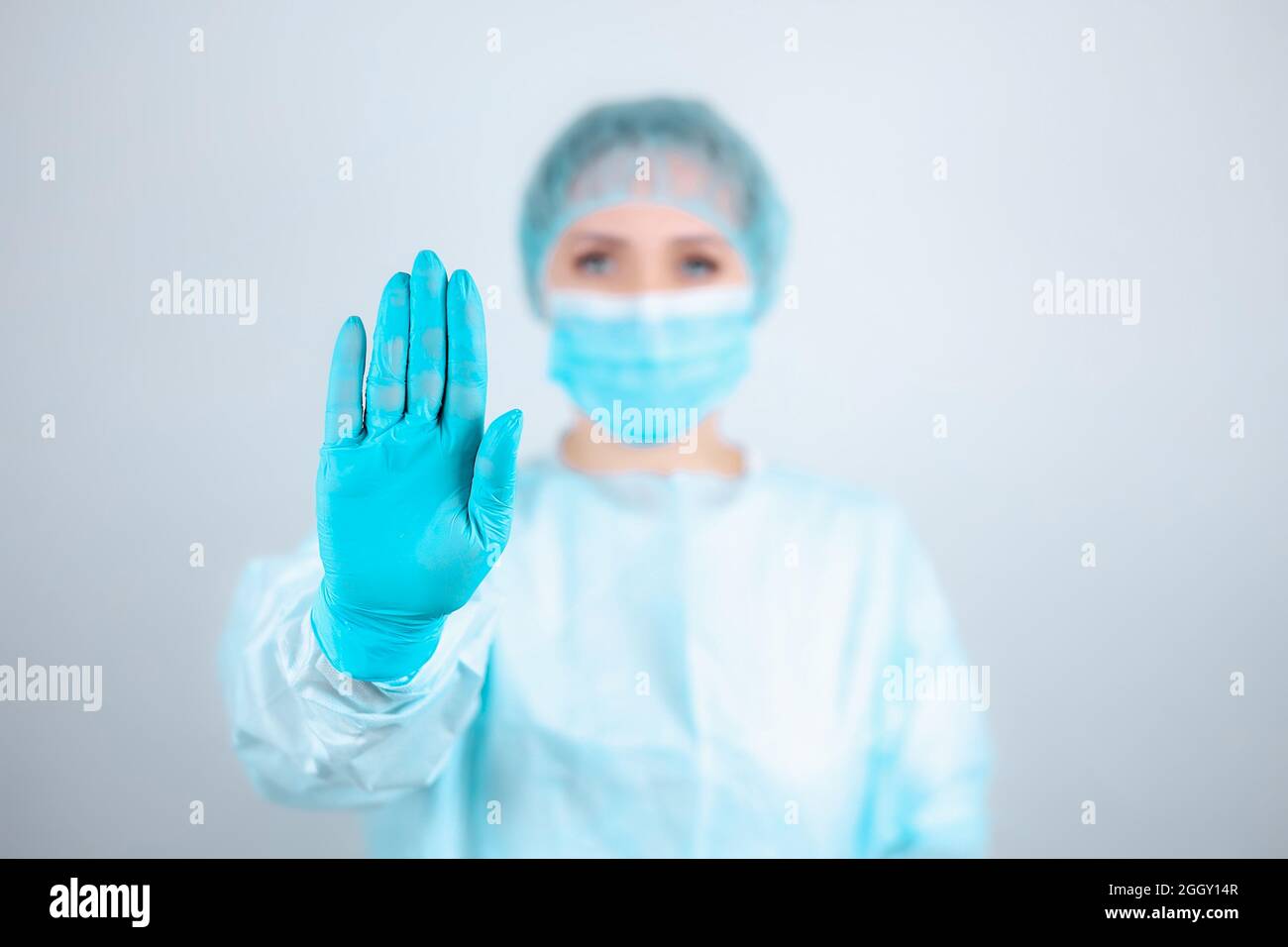 Man holding out hand stop hi-res stock photography and images - Alamy