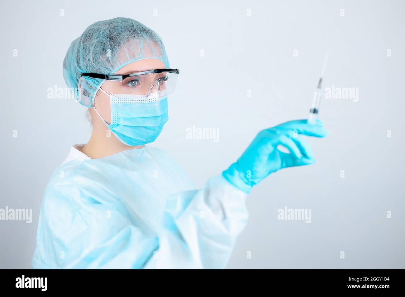 Woman hospital gown injection hi-res stock photography and images - Alamy