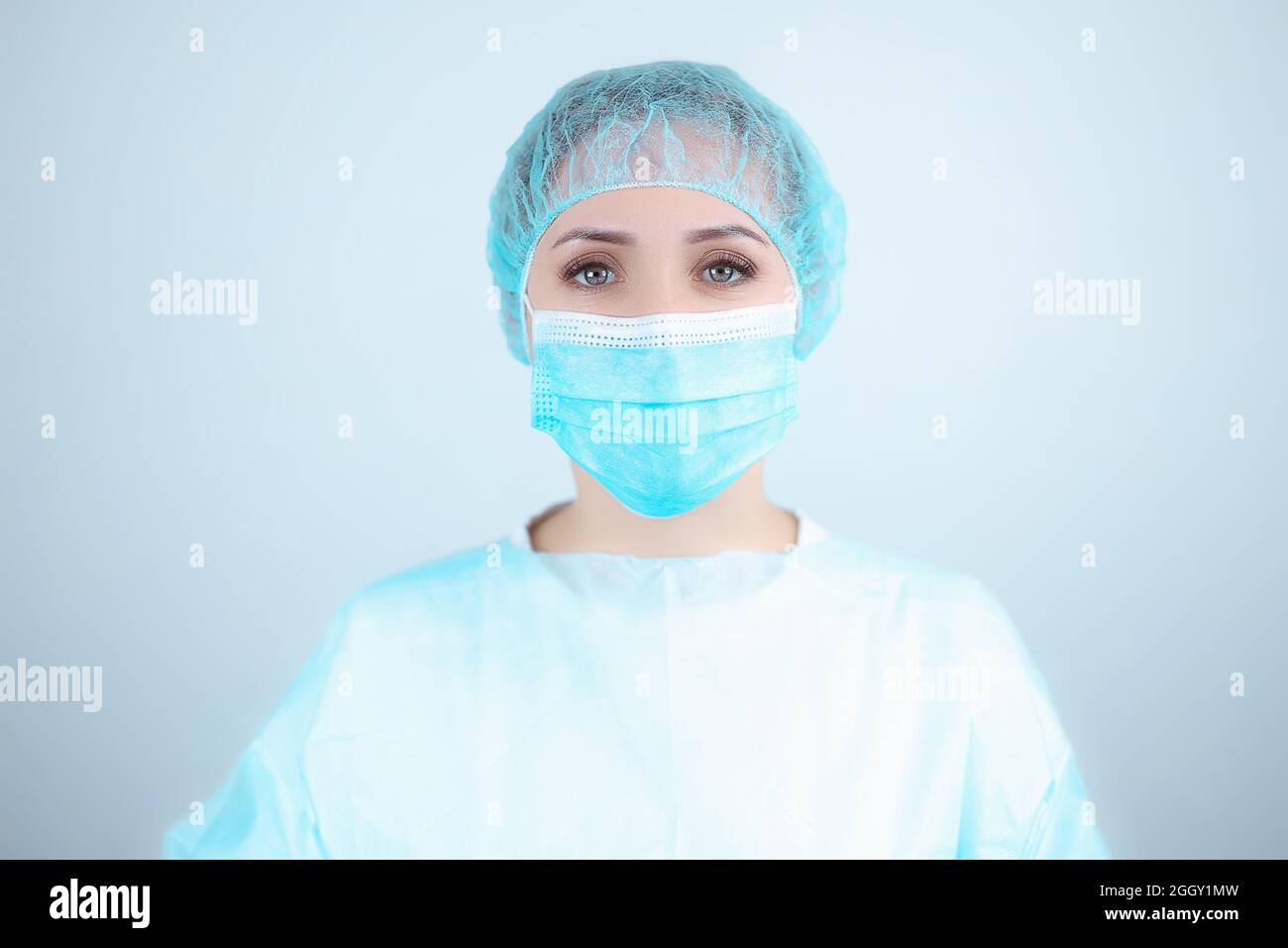 Nurse mask gown patient hi-res stock photography and images - Alamy