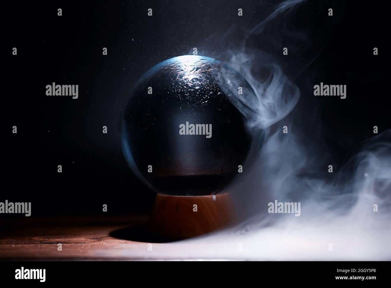 Crystal ball predict the fate. Guessing for the future Stock Photo - Alamy