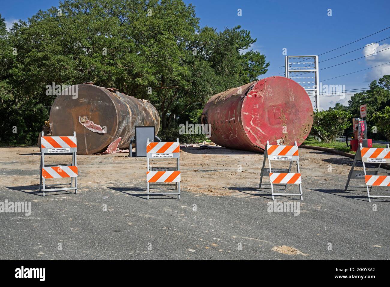 Old gas tanks at a local gas station are being removed in North Central ...