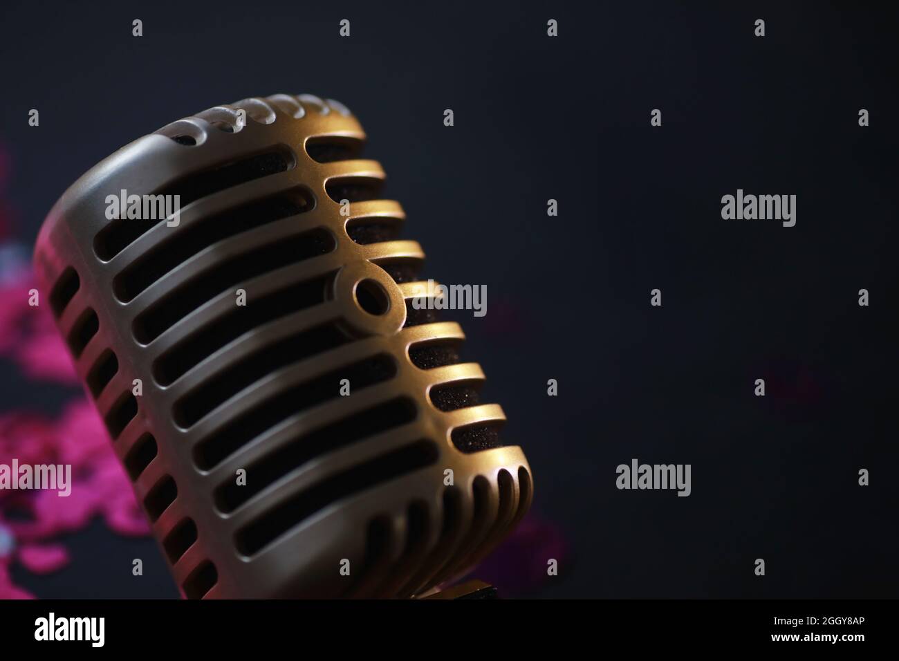 The concept of media presentations. Retro microphone on background ...