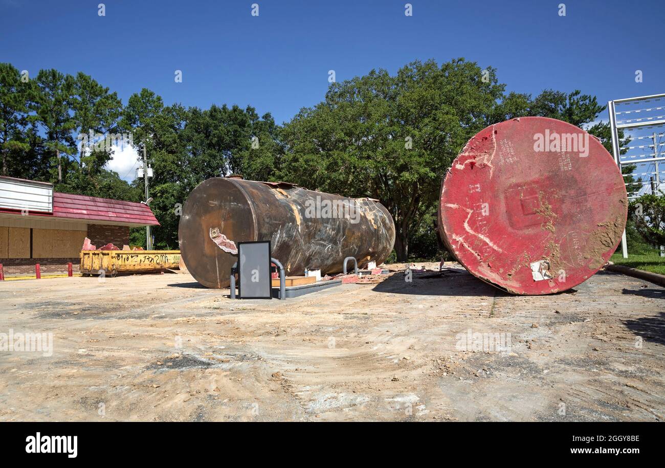 Old gas tanks at a local gas station are being removed in North Central ...