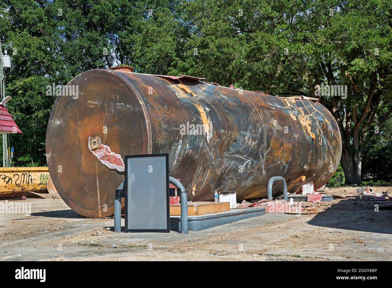 Old gas tanks at a local gas station are being removed in North Central ...