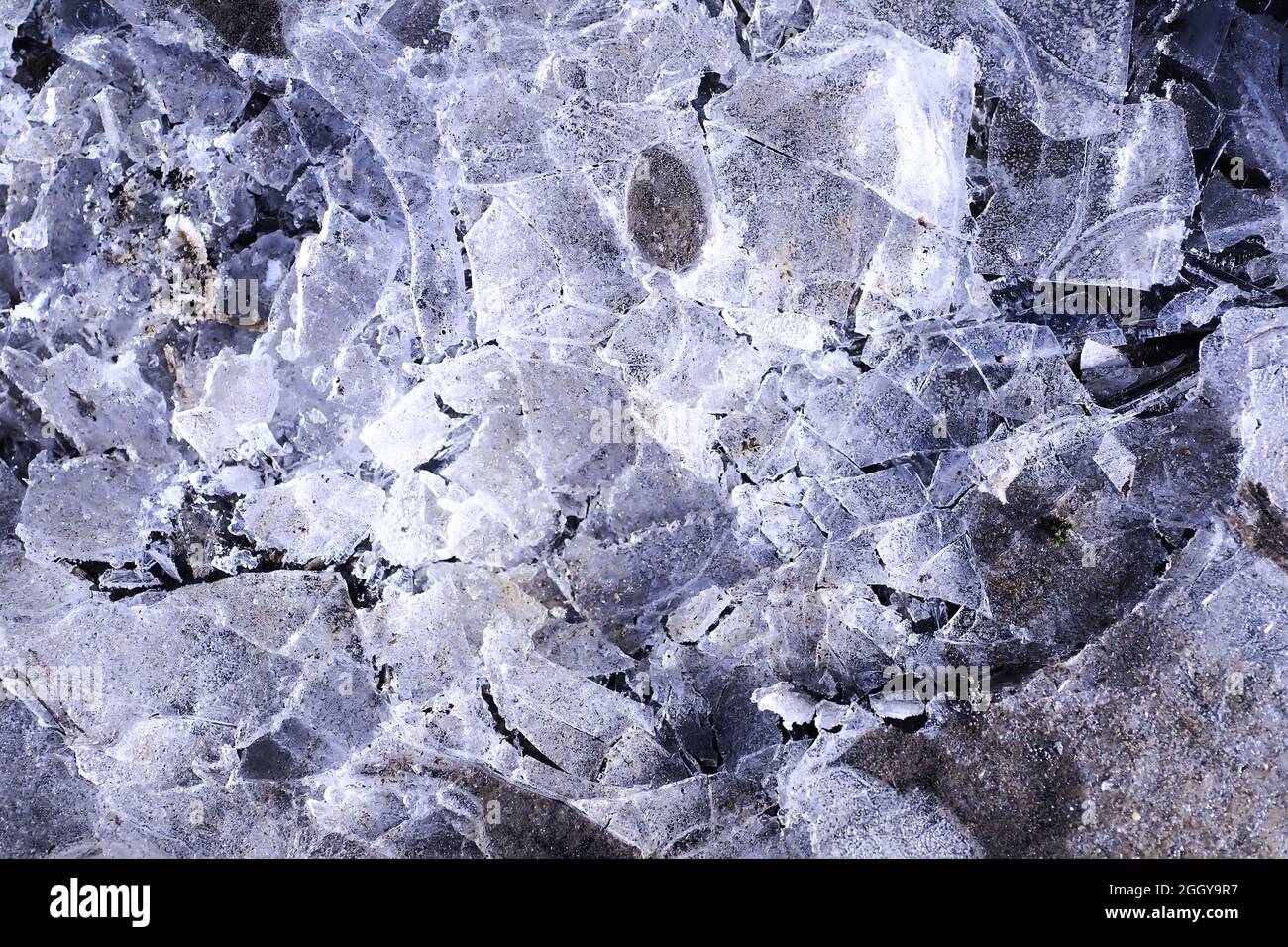 Crashed blue ice concrete surface background texture. Crashed ice ...