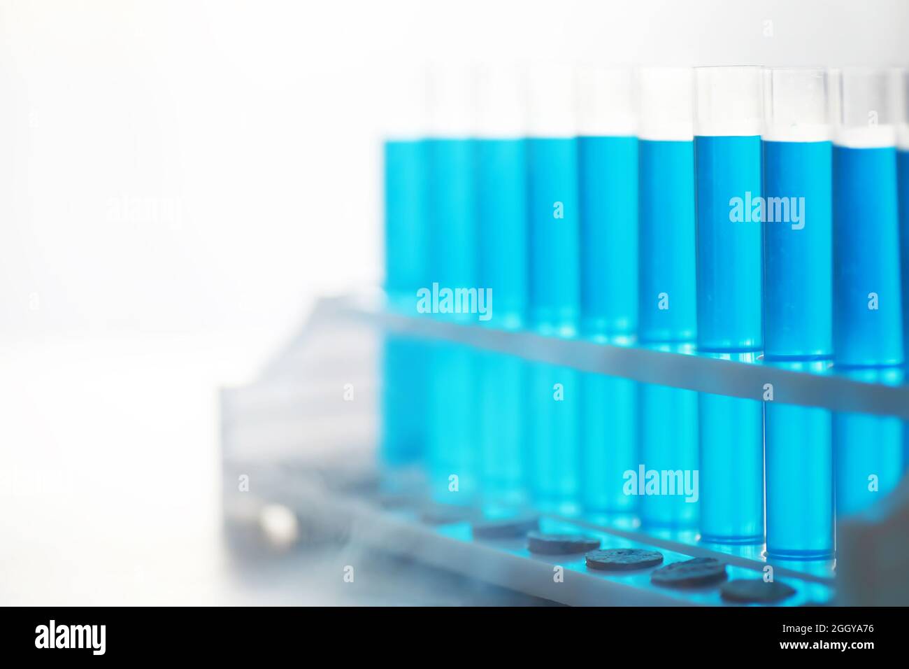 Test tube of glass overflows new liquid solution potassium blue ...