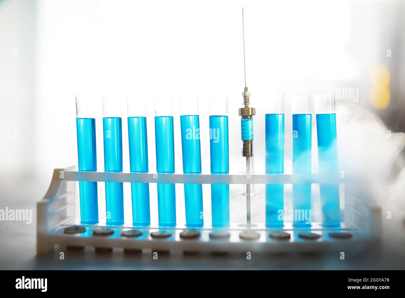 Test tube of glass overflows new liquid solution potassium blue ...