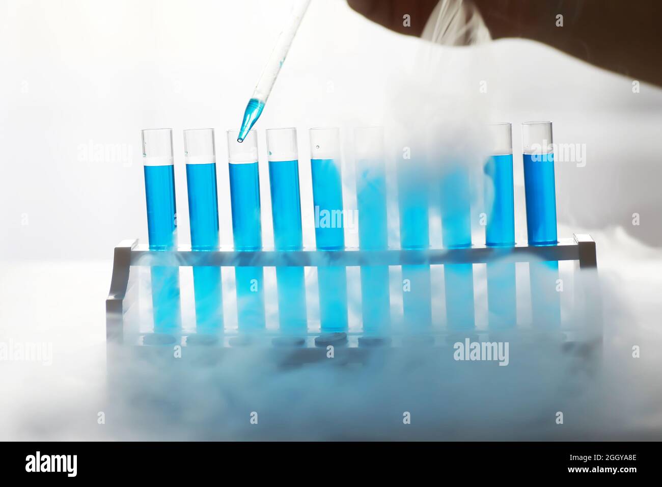 Test tube of glass overflows new liquid solution potassium blue ...