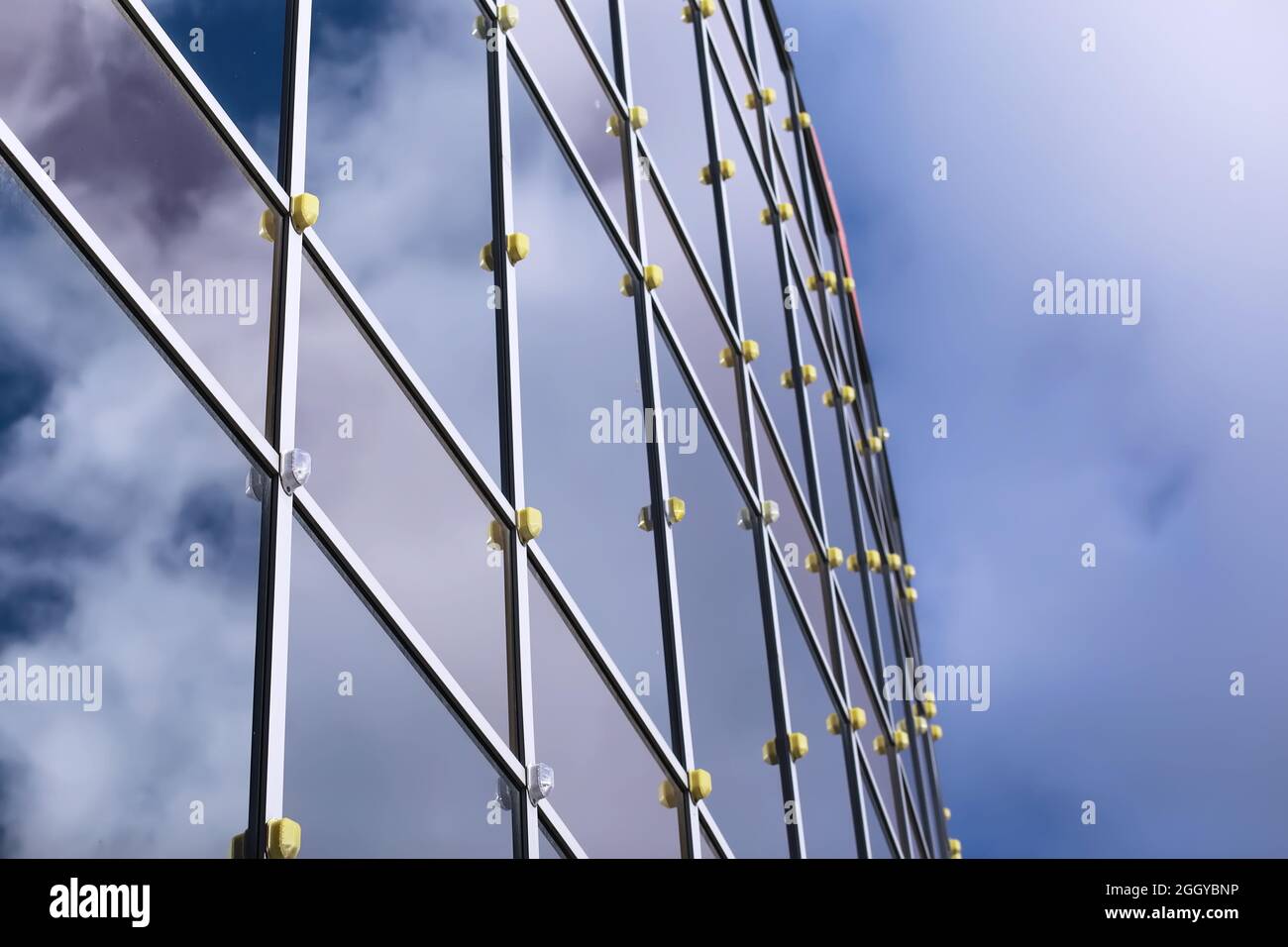 Architectural detail of the facade with multiple reflections of other ...