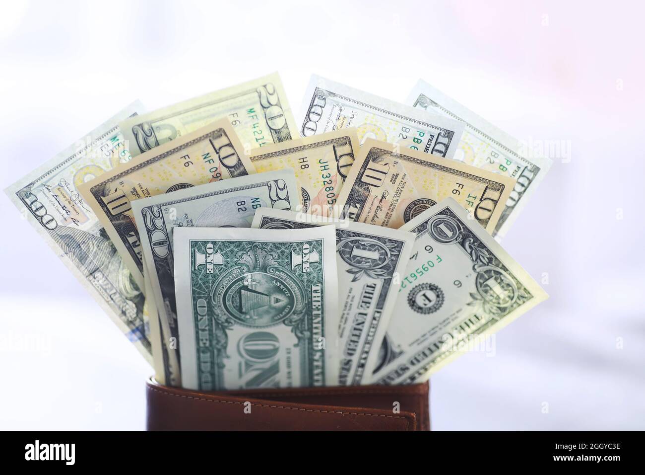 Cash money in a large pile as a finance background. Paper money close ...
