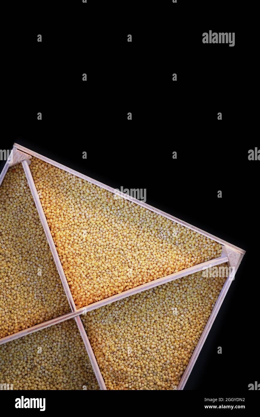 A set of grain cereals. Rice, buckwheat and millet groats in wooden ...