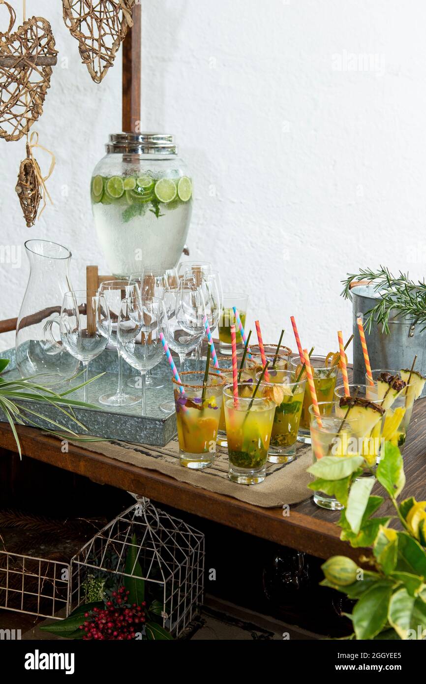 Refreshing and flavored drinks stand at the reception Stock Photo - Alamy