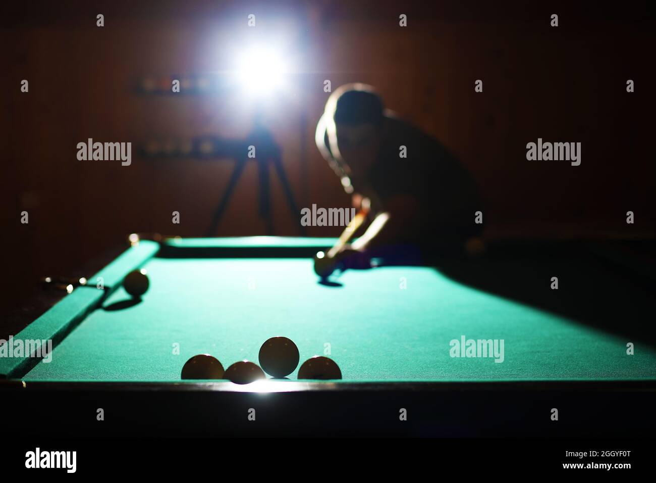 Billiard club. Gambling table with russian billiard set and dark cue ...