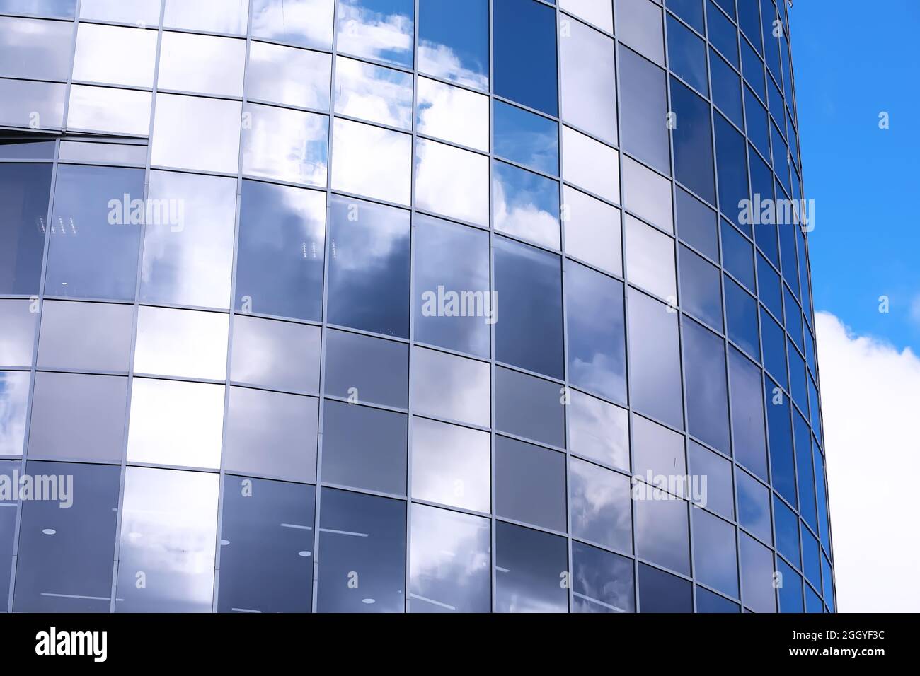 Architectural detail of the facade with multiple reflections of other ...