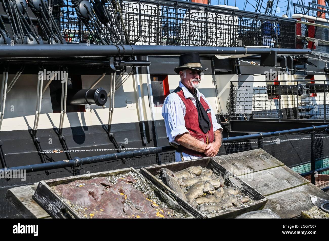 This scene is of a Victorian era Fish-monger at the quayside by the ...