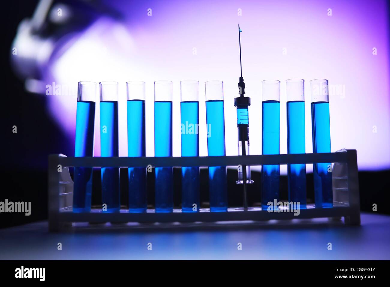 Test tube of glass overflows new liquid solution potassium blue ...