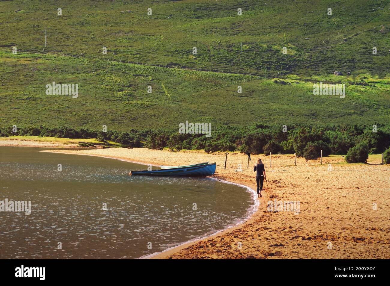 Beautiful landscape scenery of sandy beach and green hills in the ...