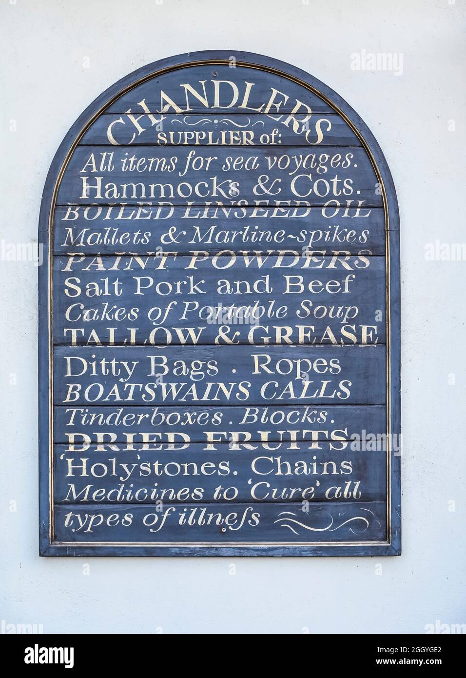 This is one of several quayside advertisement signs at the Victorian ...
