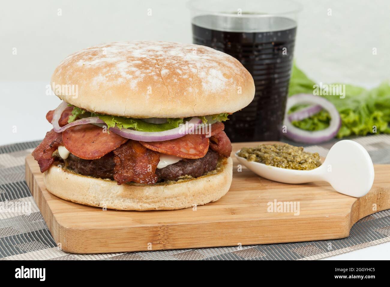 Tasty Italian Burger With Cheese, Meat, Bacon, And Slices Of Salami ...