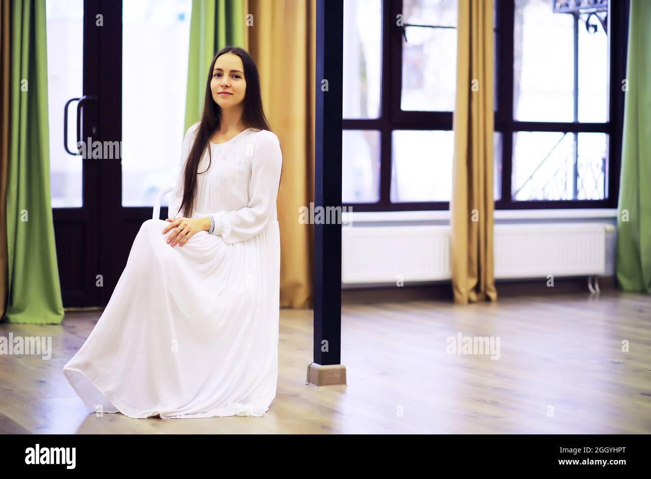 Relaxed serene pretty young woman at home, happy calm lady dream enjoy ...