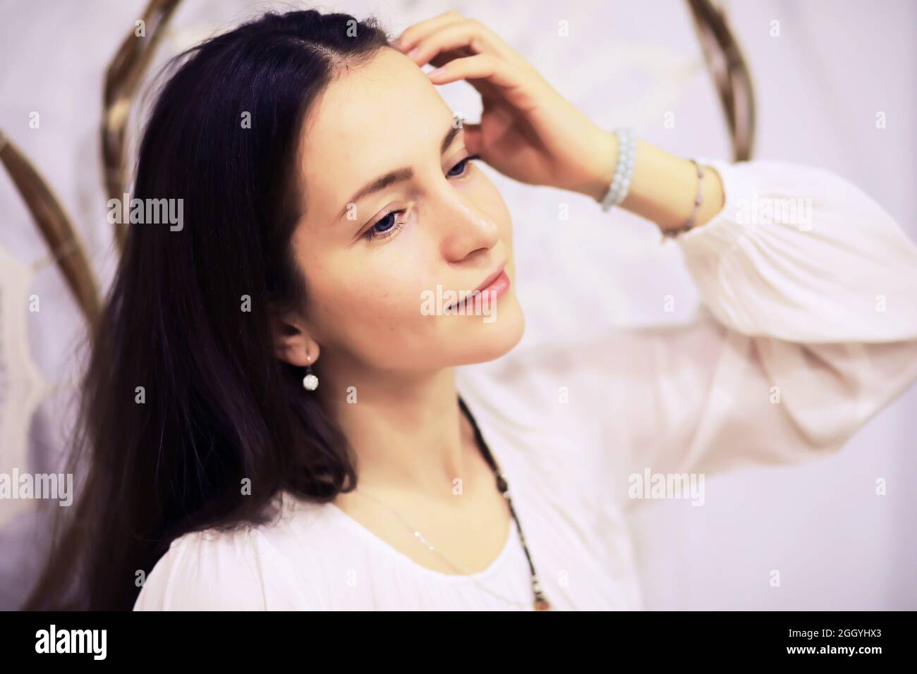 Relaxed serene pretty young woman at home, happy calm lady dream enjoy ...