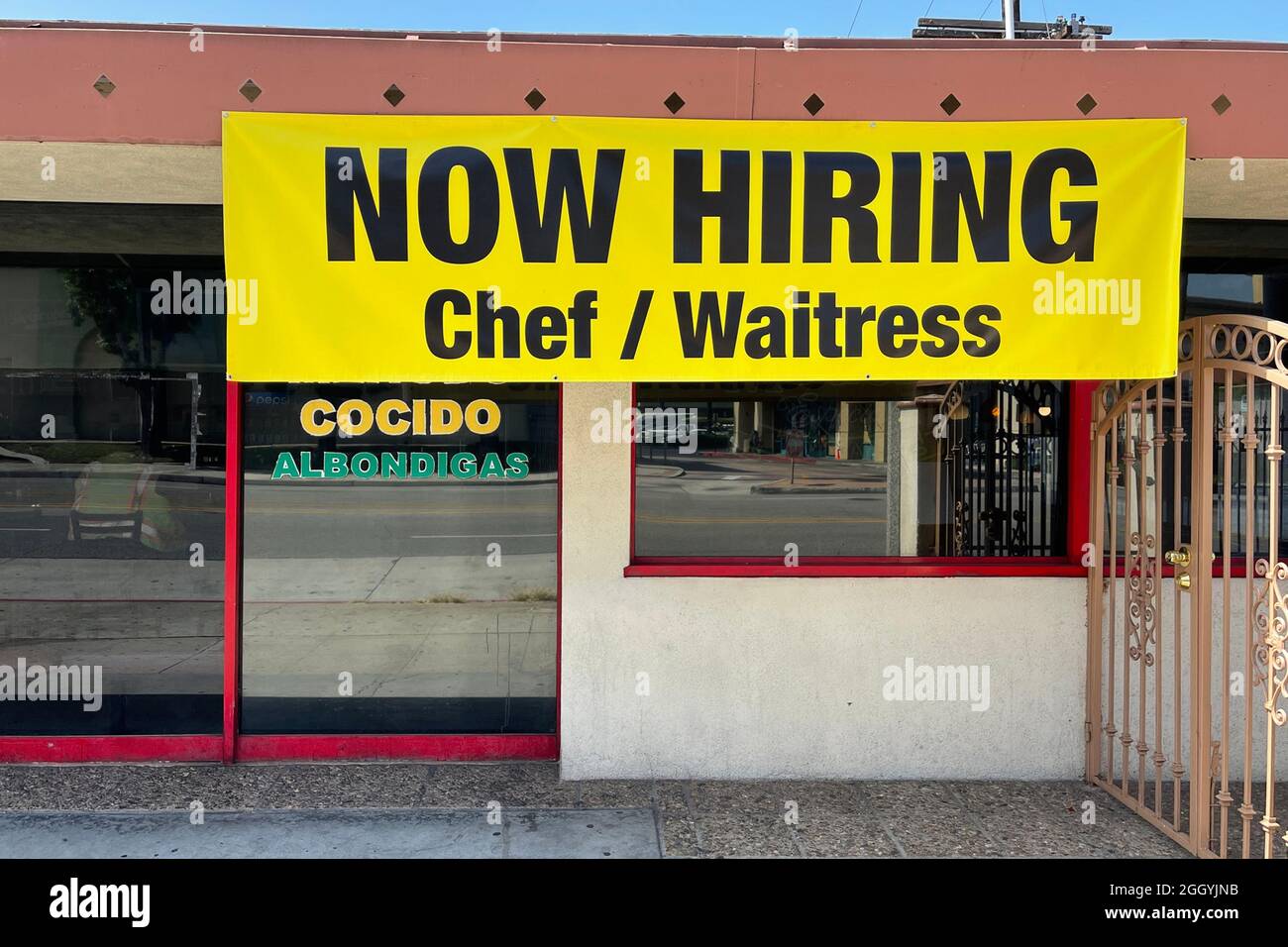 A Now Hiring Chef and Waitress sign at Tommy's Restaurant, Friday, Sept ...