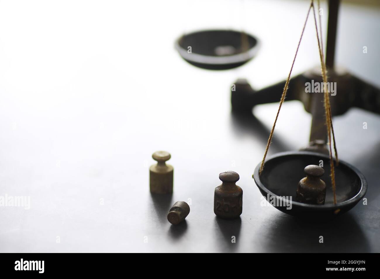 Tiny weights vintage balance scales. Detail of Ancient old scale ...