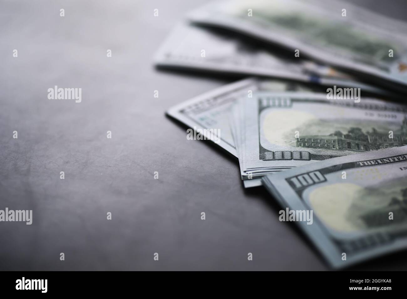 Cash money in a large pile as a finance background. Paper money close ...