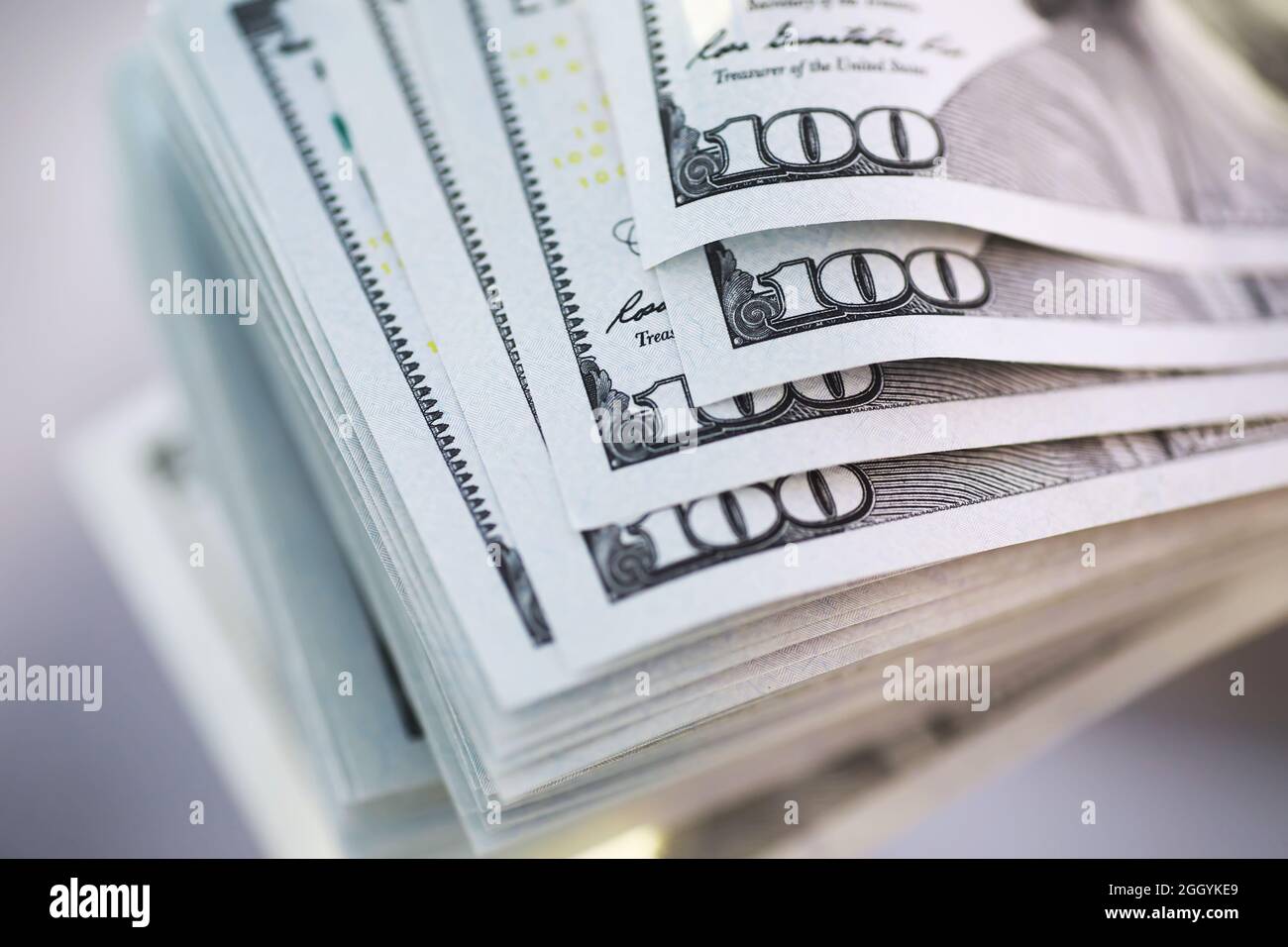 Cash money in a large pile as a finance background. Paper money close ...