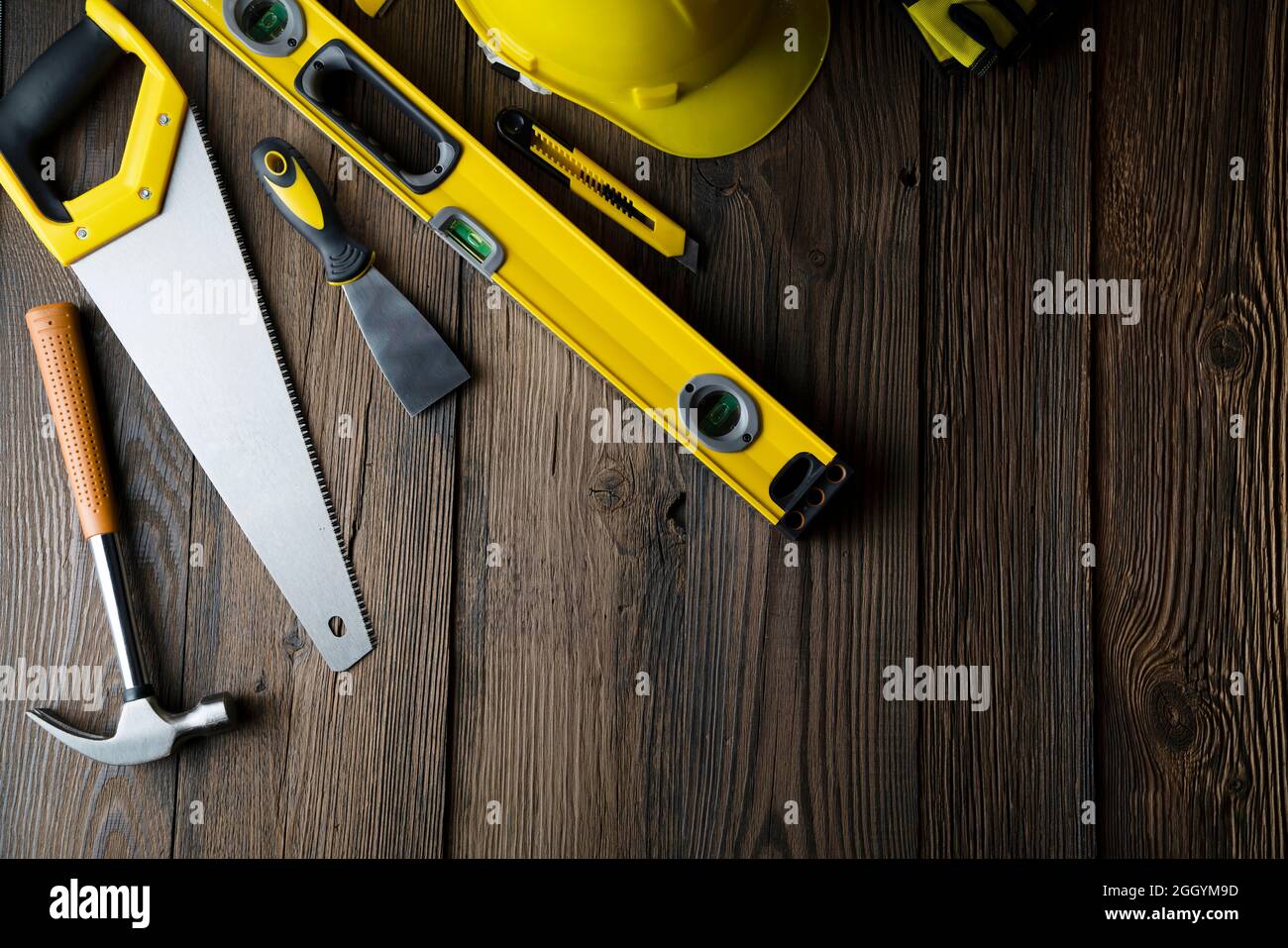 Contractor theme. Tool kit of the contractor: yellow hardhat, libella ...