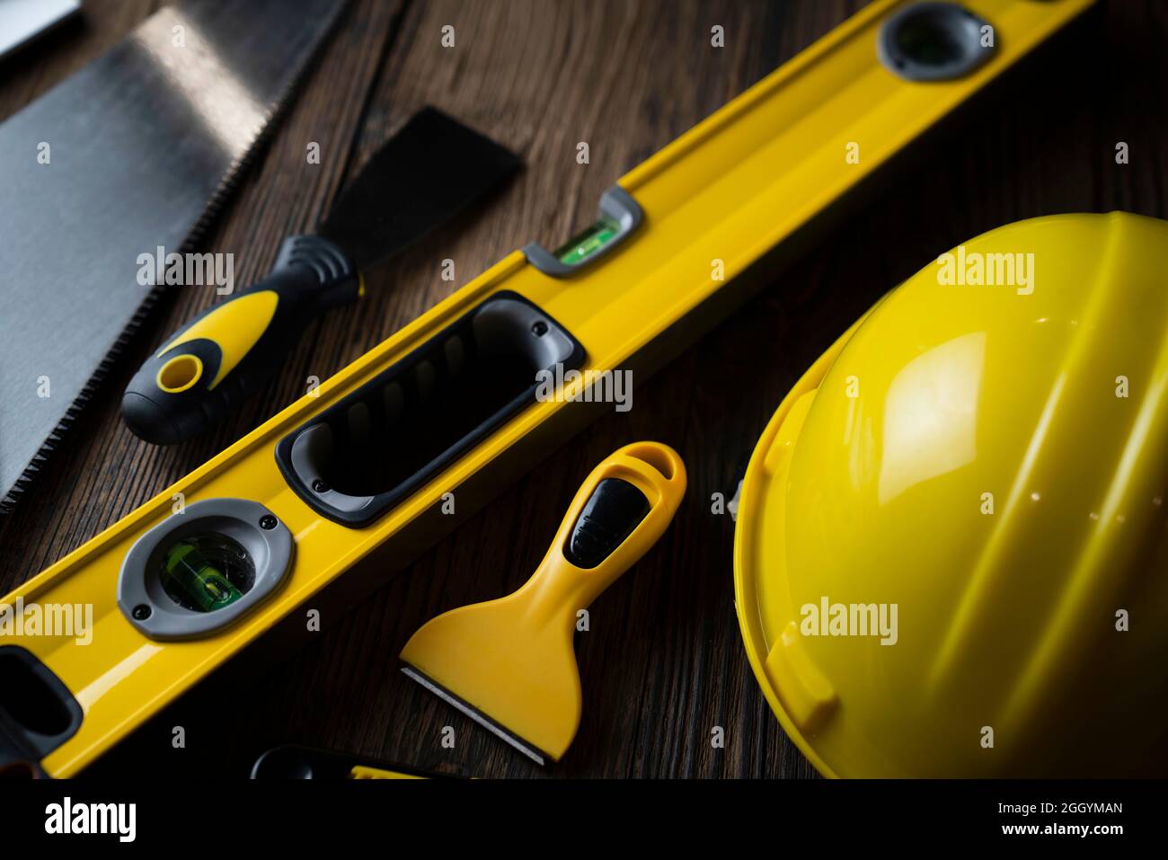 Contractor theme. Tool kit of the contractor: yellow hardhat, libella ...