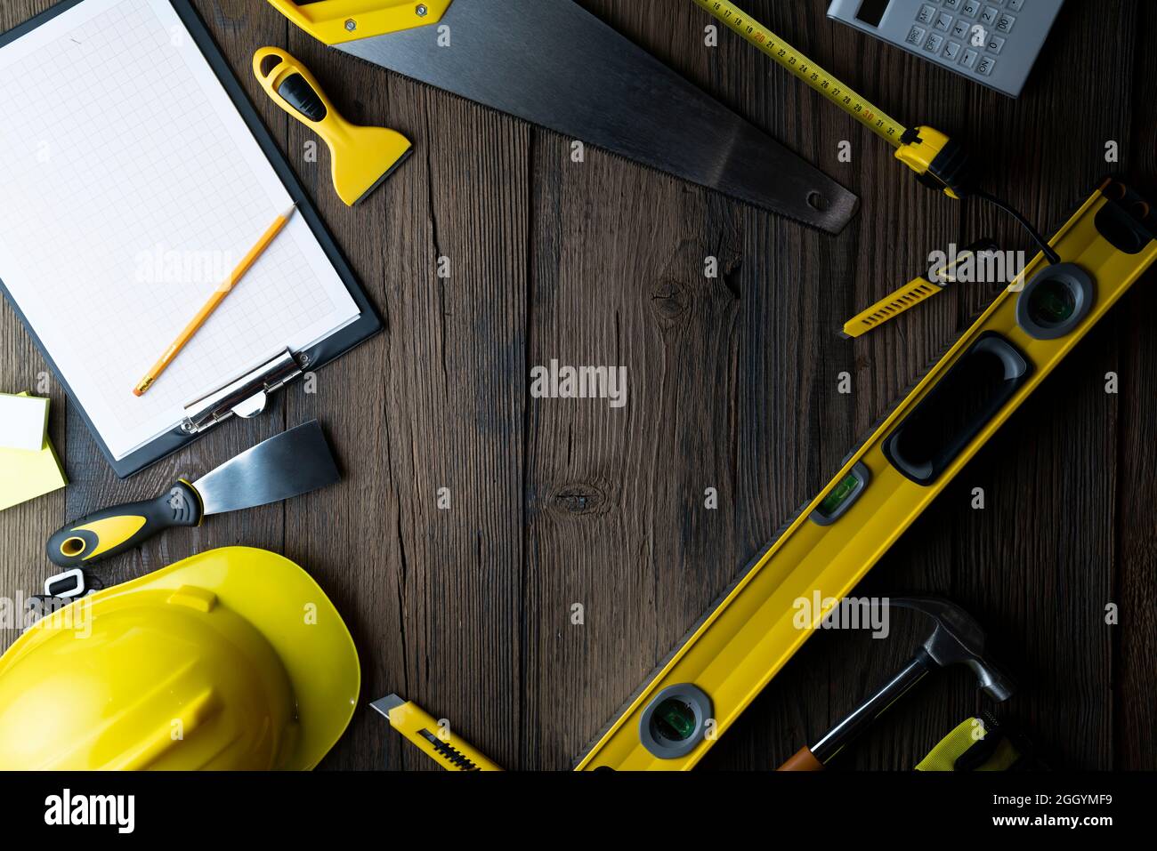 Contractor theme. Tool kit of the contractor: yellow hardhat, libella ...