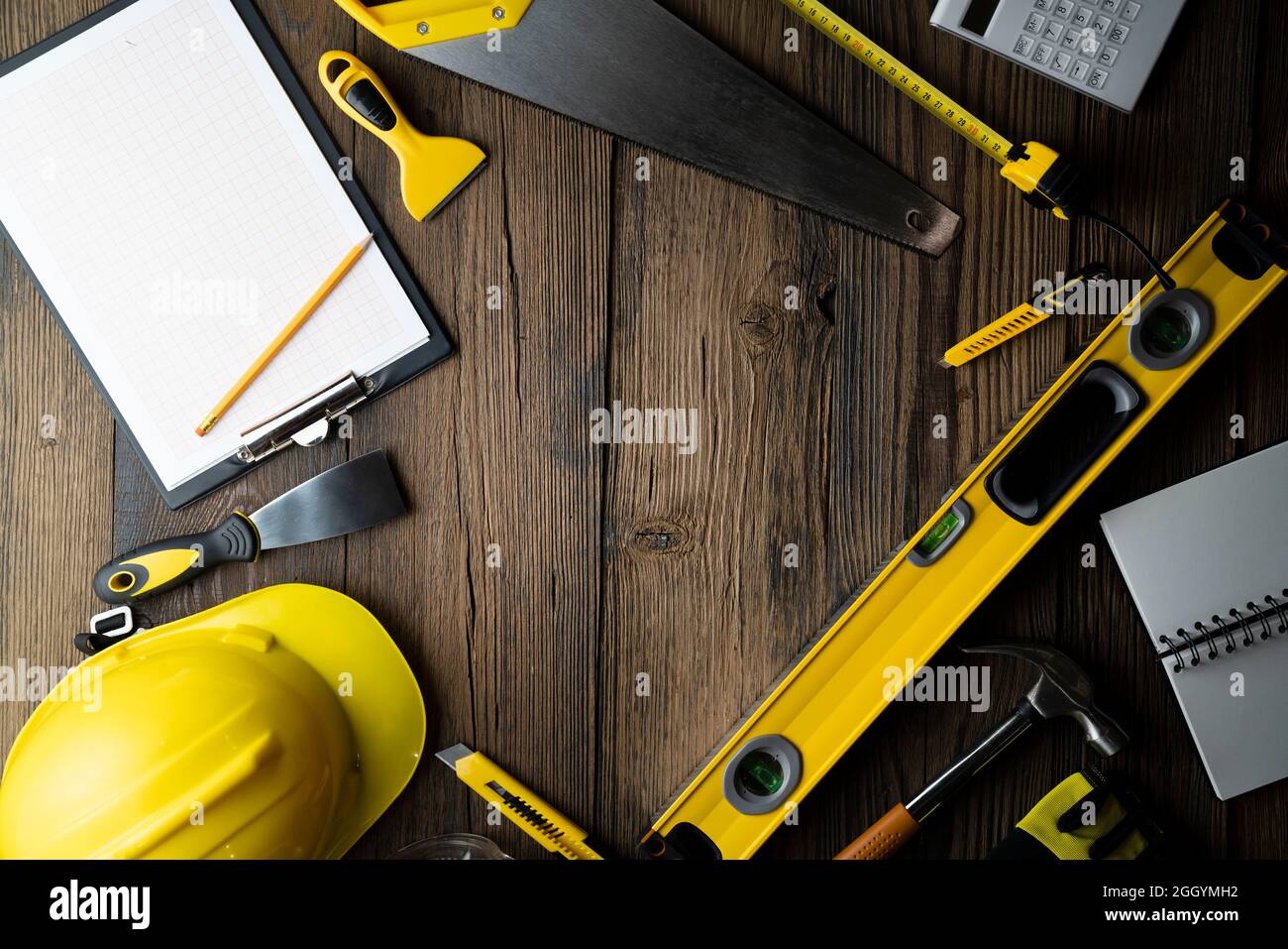 Contractor theme. Tool kit of the contractor: yellow hardhat, libella ...