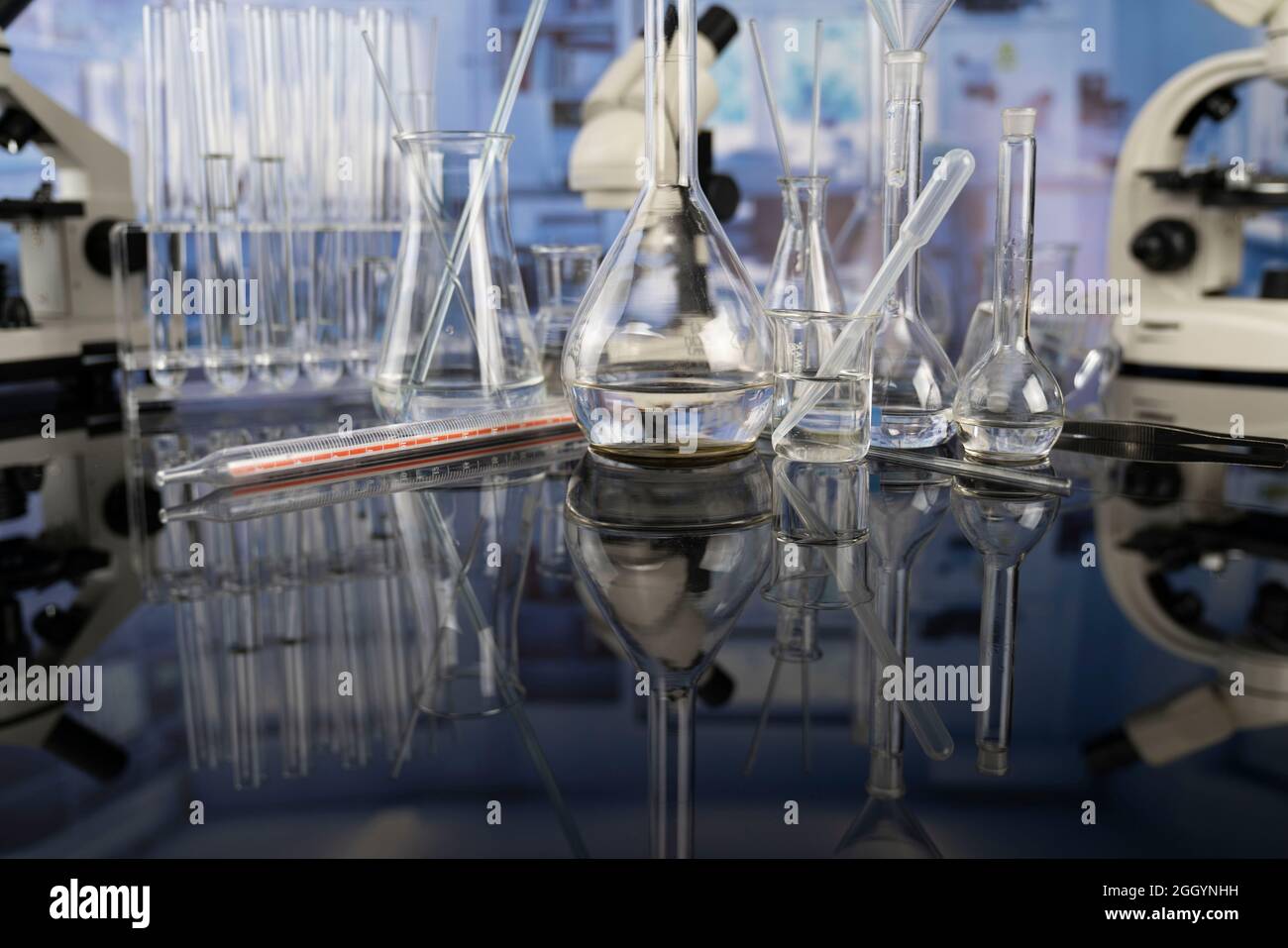 Laboratory investigations concerning covid pandemy. Microscope, glass ...