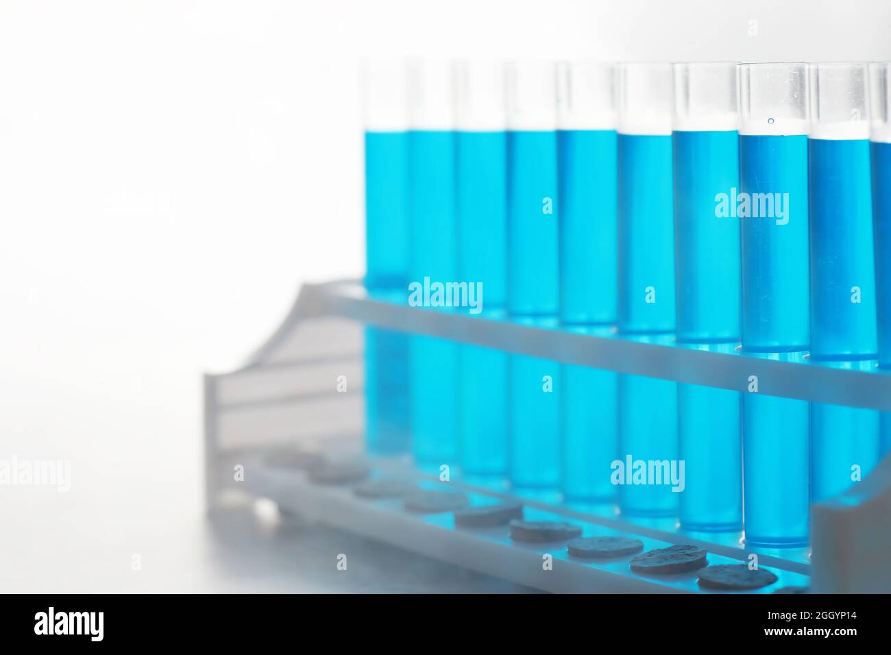 Test tube of glass overflows new liquid solution potassium blue ...