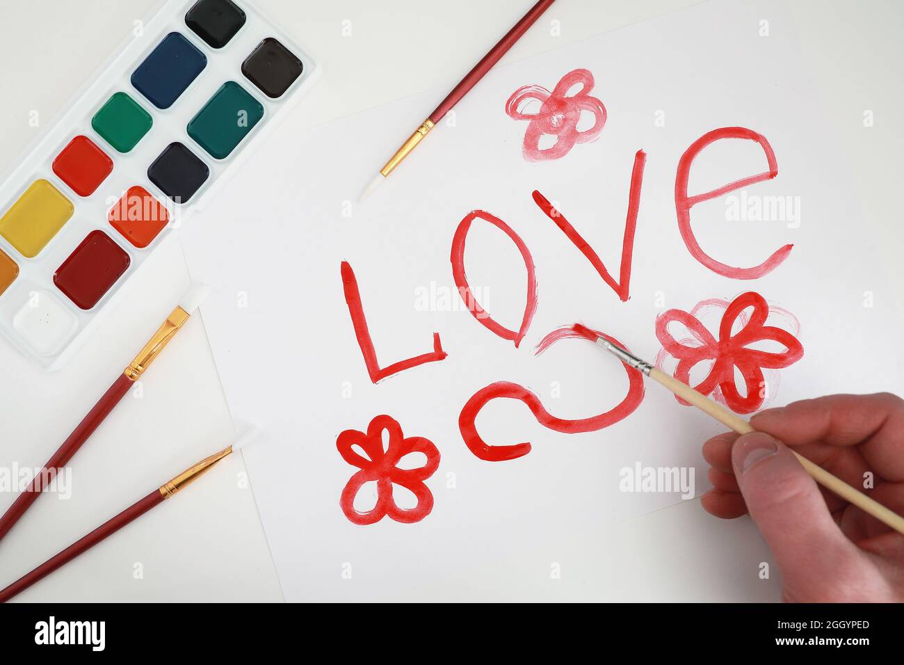 Stationery for drawing paints on a white sheet of paper Stock Photo - Alamy