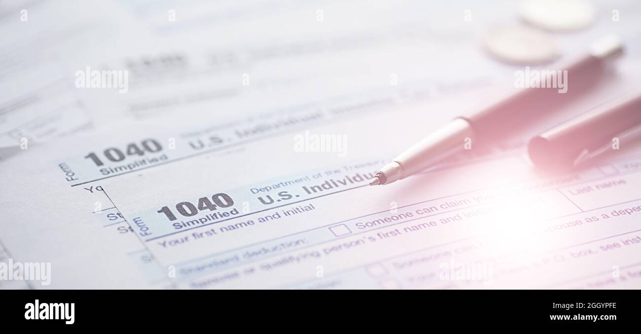 Annual tax reporting. Tax form on the table. Financial statements ...