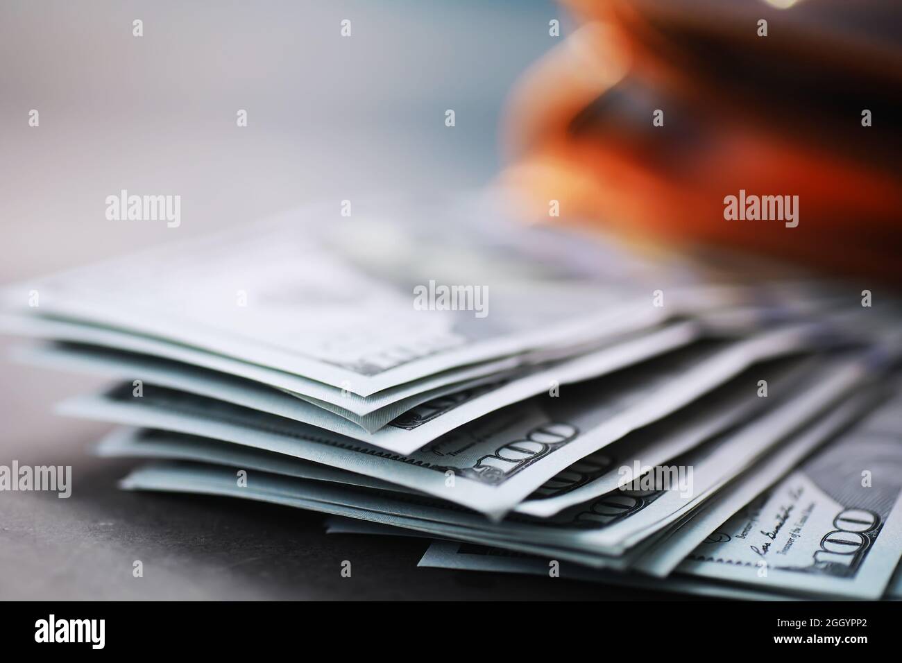 Cash money in a large pile as a finance background. Paper money close ...