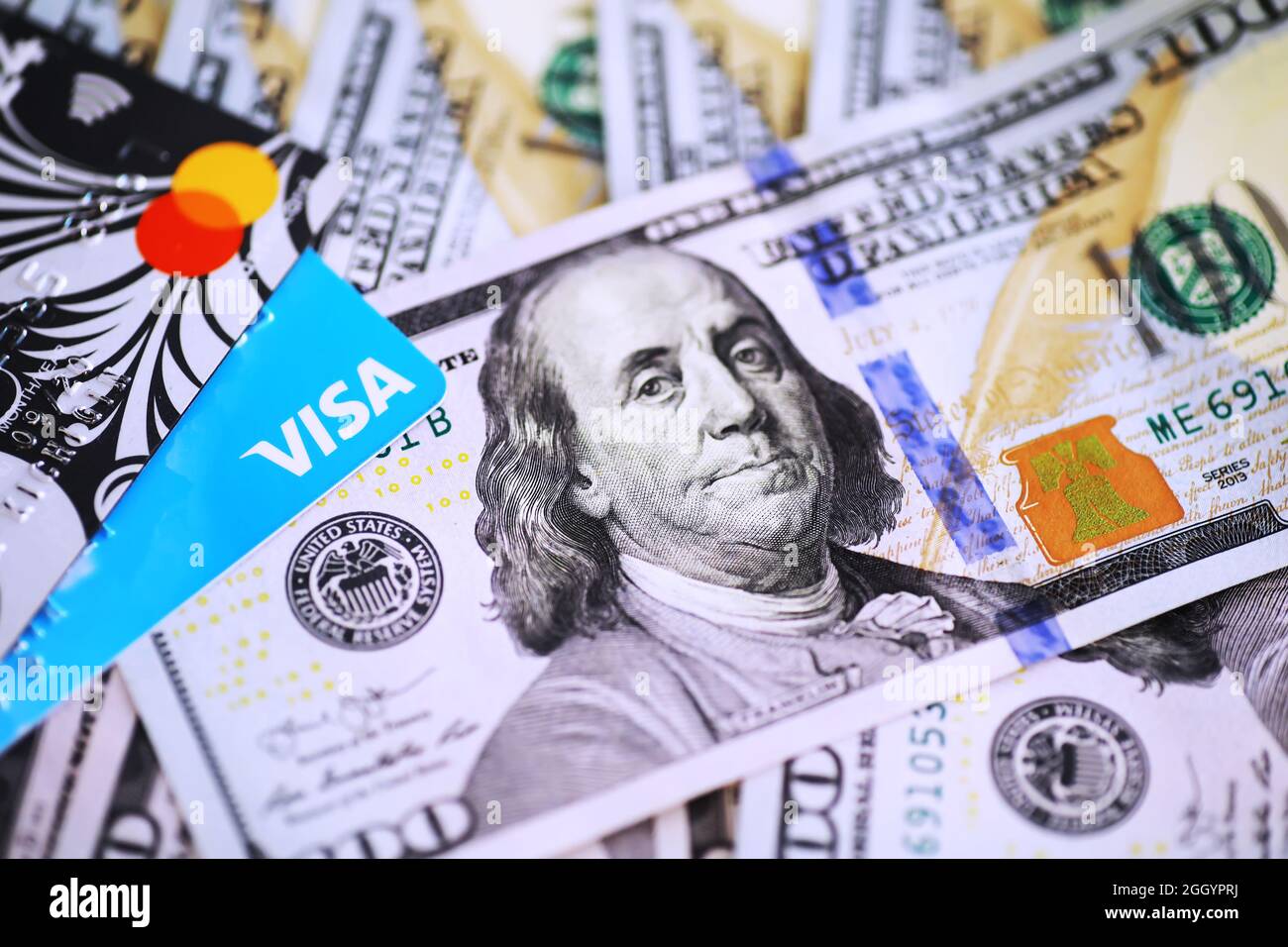 Cash money in a large pile as a finance background. Paper money close ...