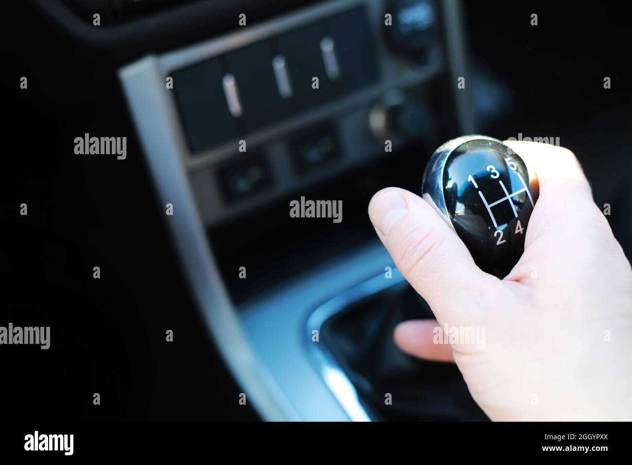 Gear lever. Manual Transmission. Hand on the gear shift in the car ...